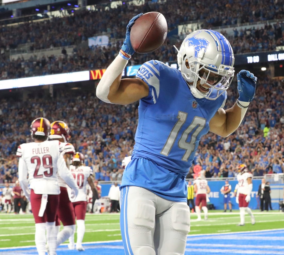 Lions WR Amon-Ra St. Brown exits with concussion - Field Level Media ...