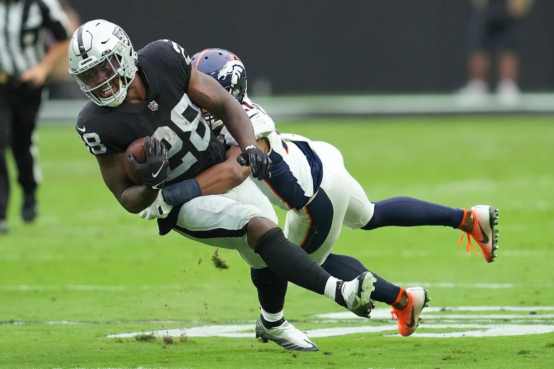 Raiders get into win column, run past Broncos - Field Level Media ...