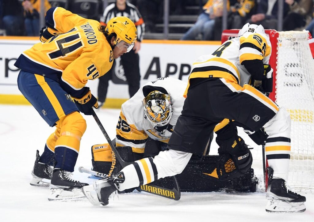 Penguins score twice late to beat Predators - Field Level Media ...