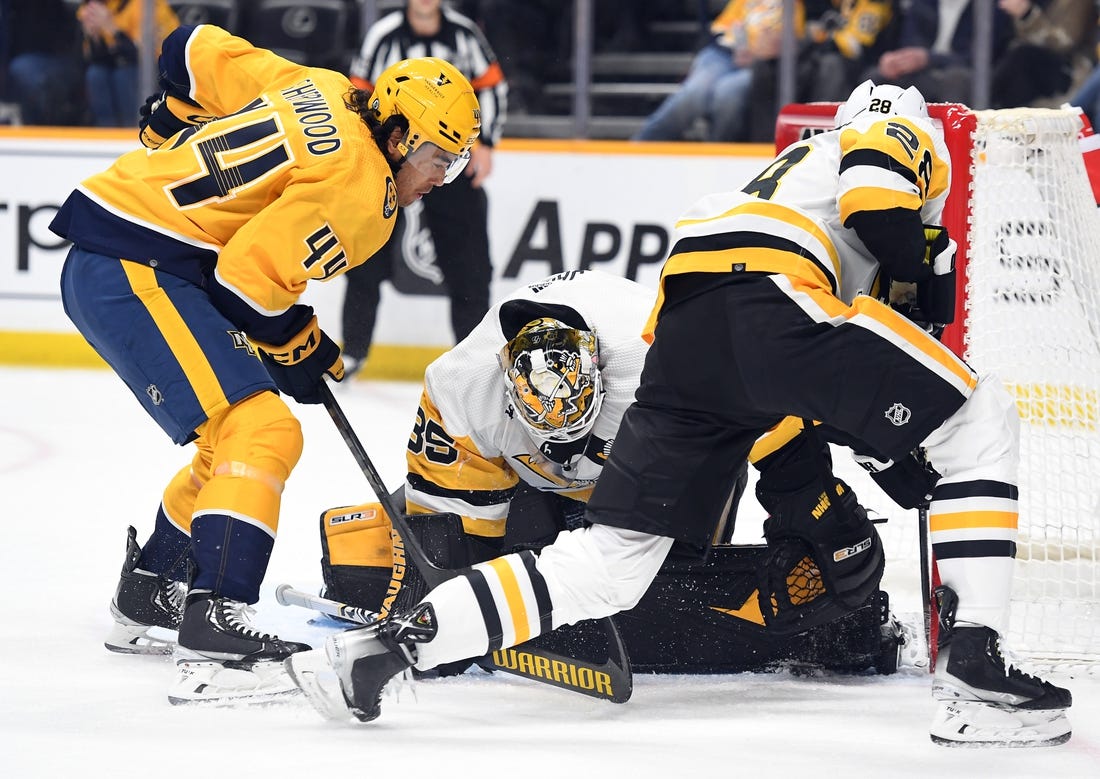Penguins score twice late to beat Predators - Field Level Media ...