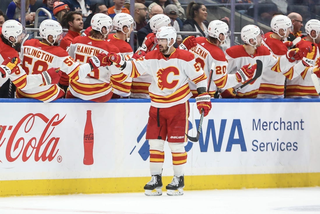 MacKenzie Weegar's hat trick leads Flames past Islanders - Field Level ...