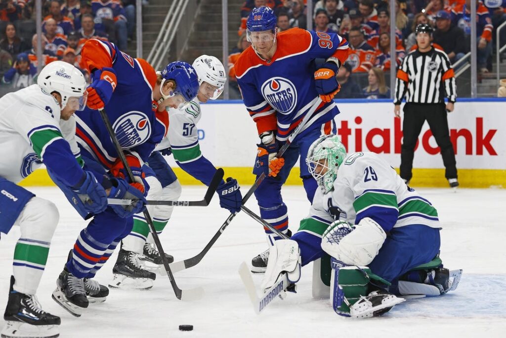 Canucks complete season sweep of Oilers - Field Level Media ...