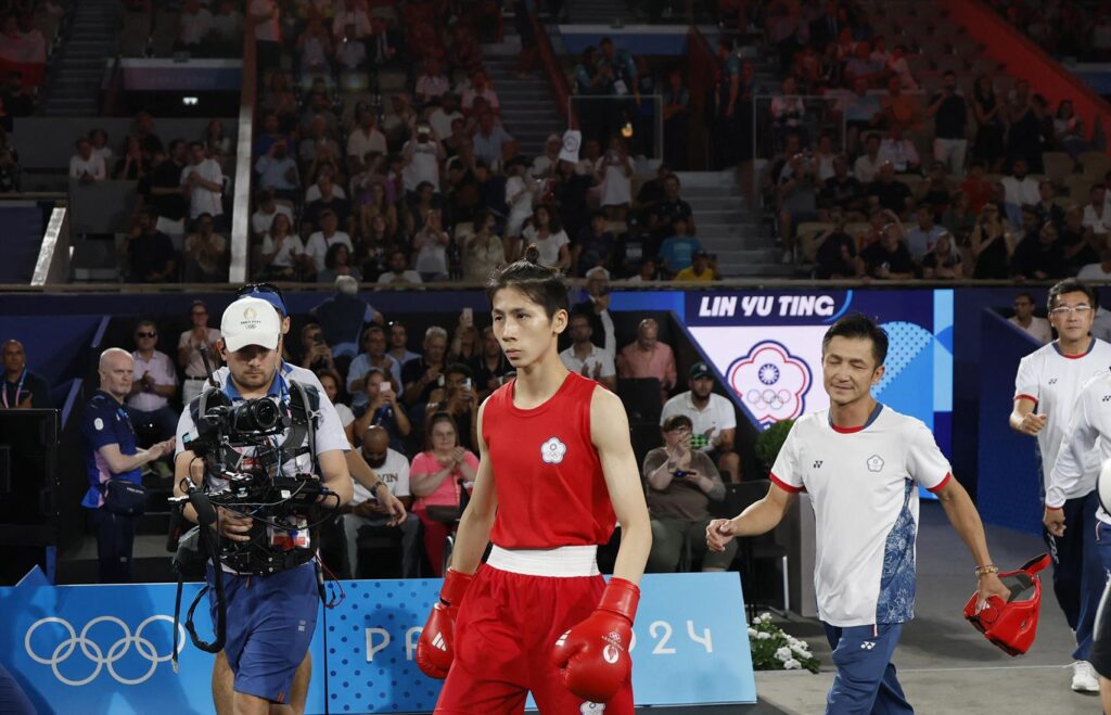 Taiwan's Lin Yu-ting wins women's featherweight gold amid gender ...