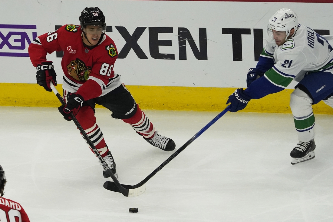 Canucks run winning streak to 3, beating Blackhawks - Field Level Media ...