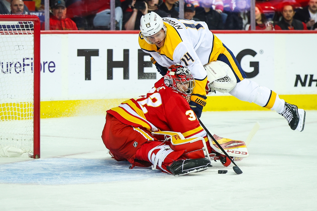 Dustin Wolf gets first shutout as Flames top Preds - Field Level Media ...