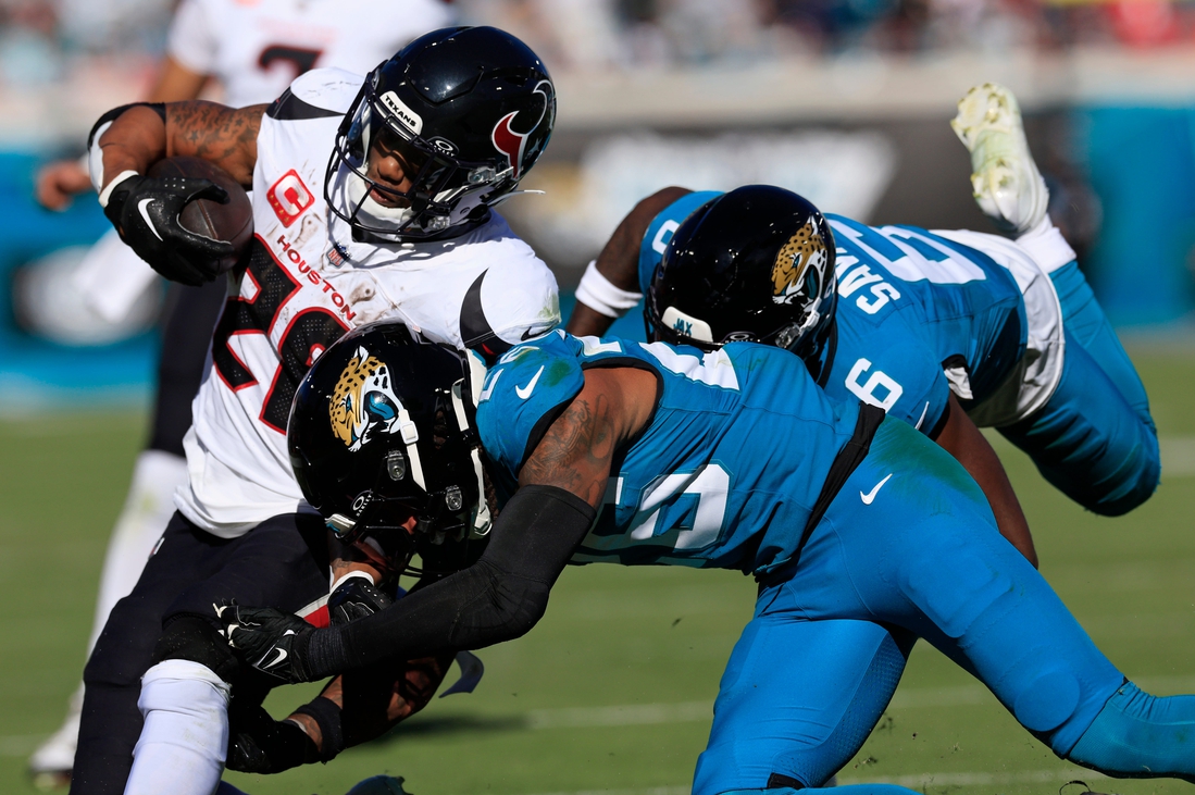 Jaguars lose Trevor Lawrence to injury, fall to Texans - Field Level ...