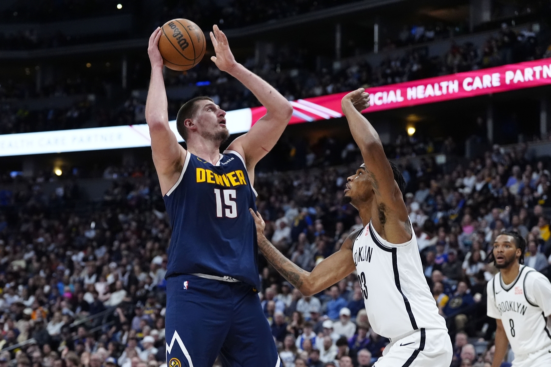 Nuggets get two triple-doubles, thrash Nets - Field Level Media ...