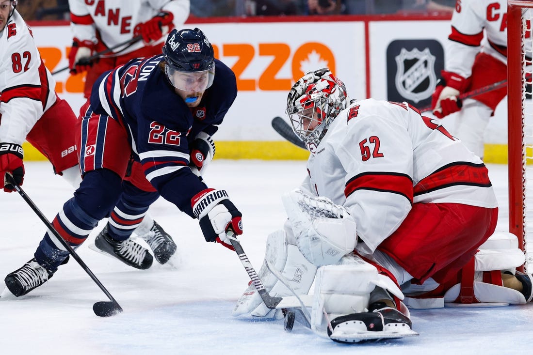 Eric Comrie, streaking Jets shut out Hurricanes - Field Level Media ...