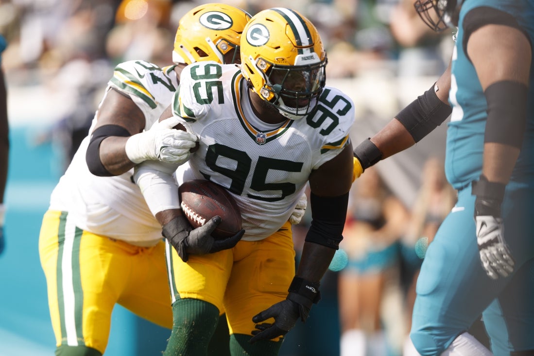 Report: Packers pick up 5th-year option on Devonte Wyatt - Field Level ...