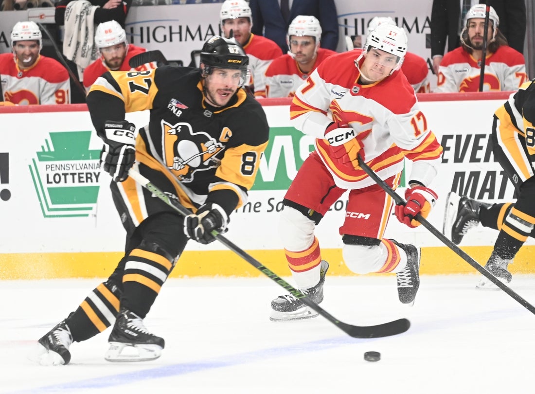 Flames halt 4-game skid, cool off red-hot Penguins - Field Level Media ...