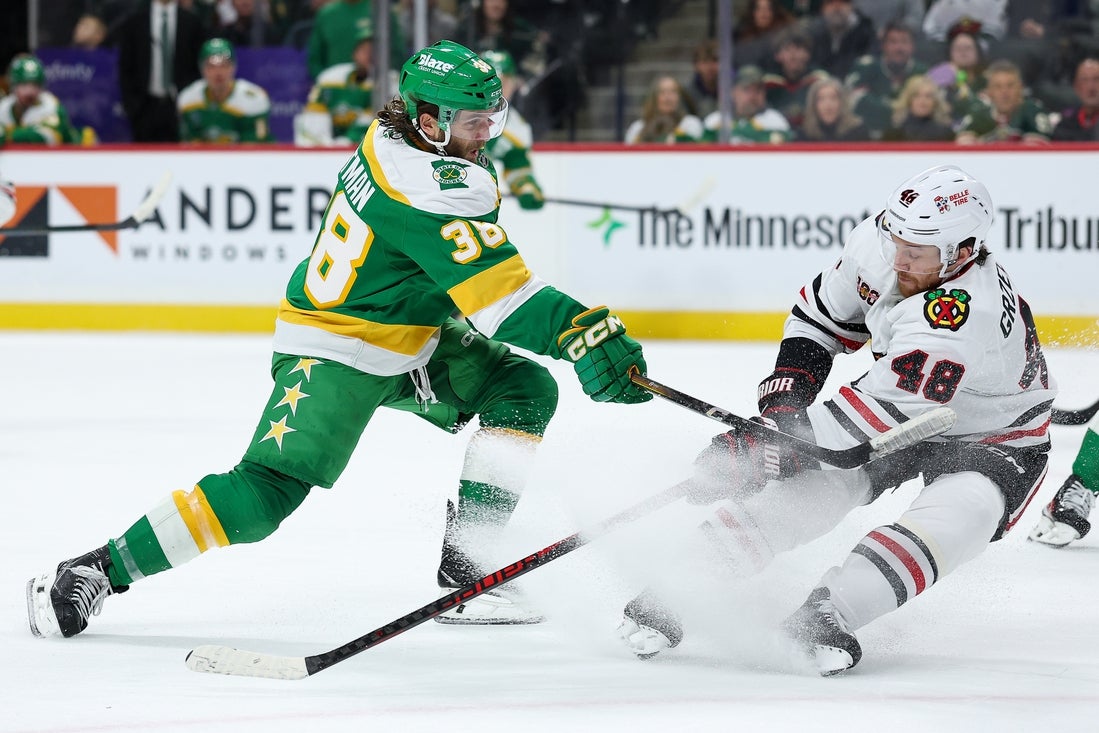 Wild escape 3-goal hole, topple Blackhawks in shootout - Field Level ...